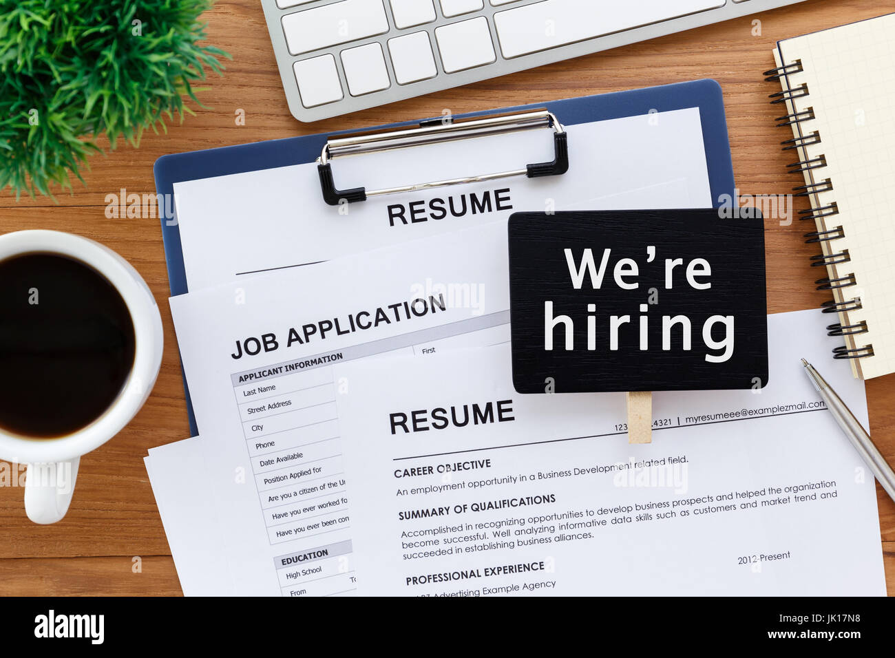 Job offer and recruitment with we are hiring sign resume and job ...