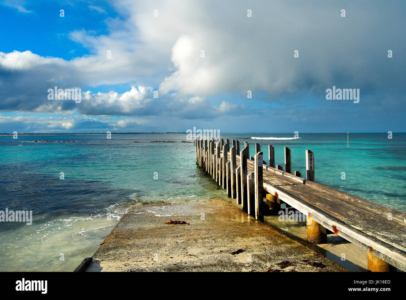 Tropical seascape with wooden jetty Stock Photo - Alamy