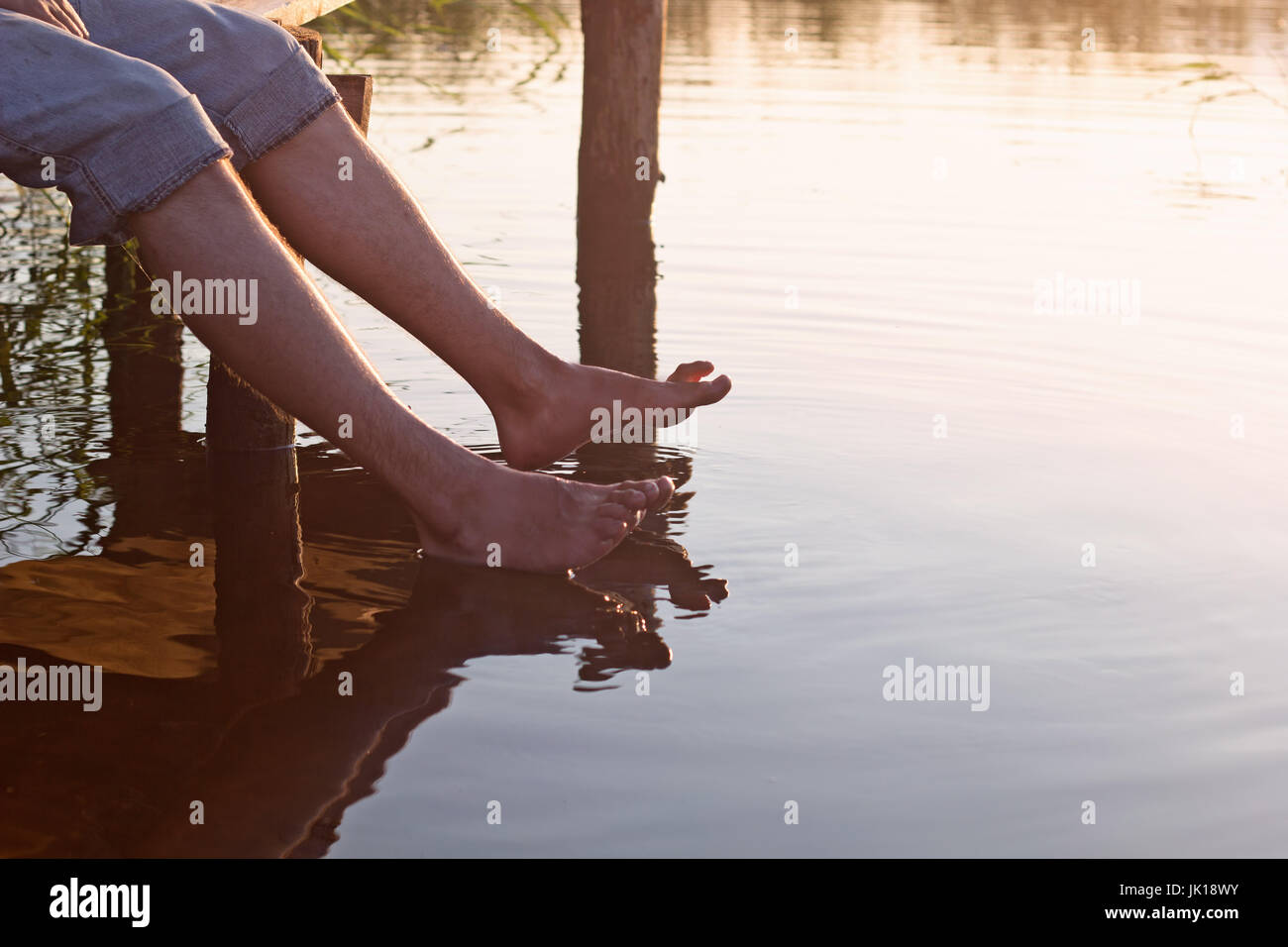 Dip foot in water hi-res stock photography and images - Alamy