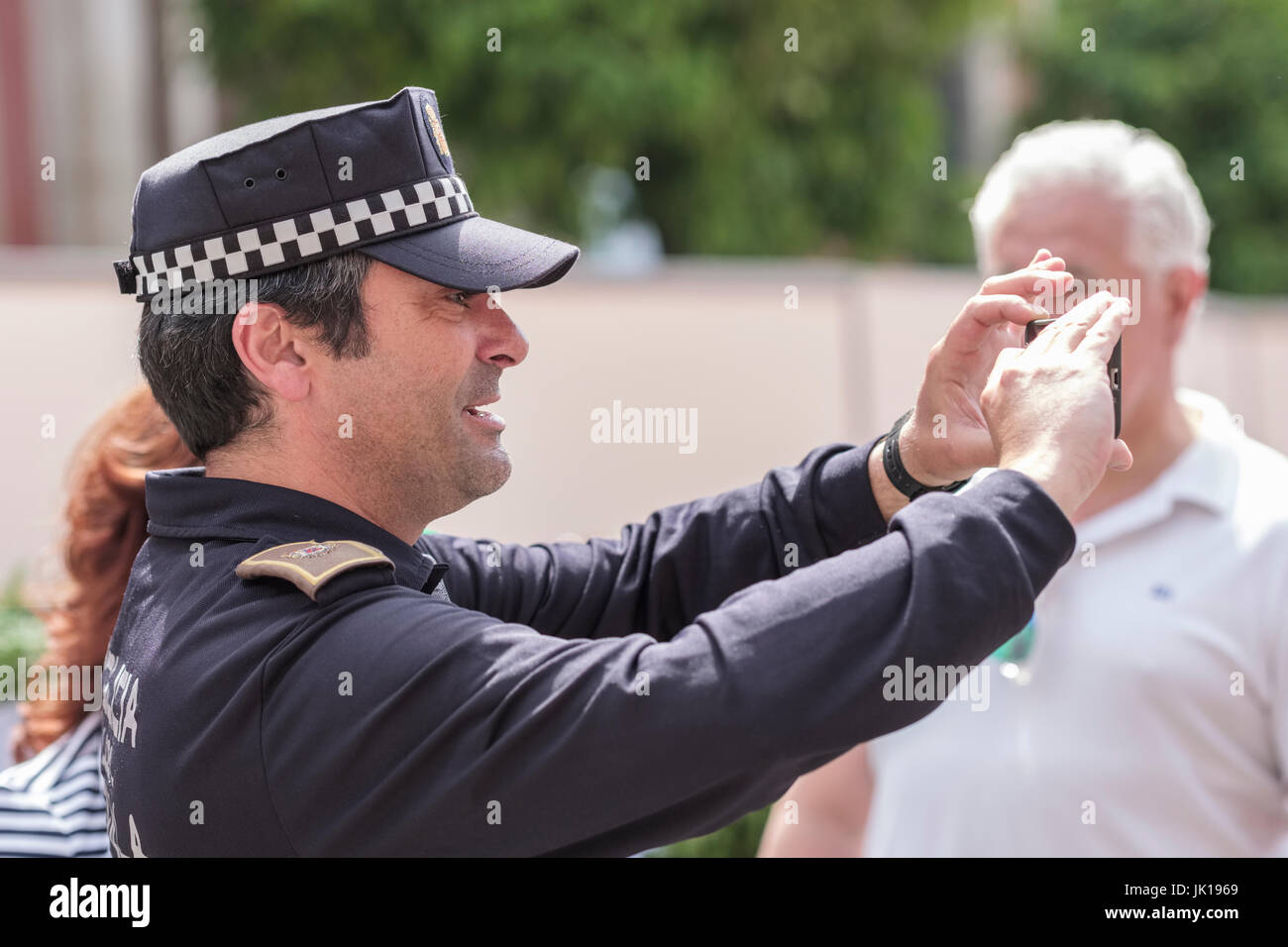 Policeman Taking Photograph High Resolution Stock Photography and ...