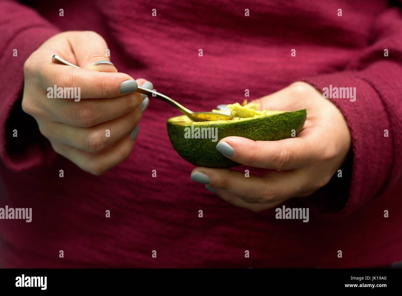Woman spoon scoop avocado hi-res stock photography and images - Alamy