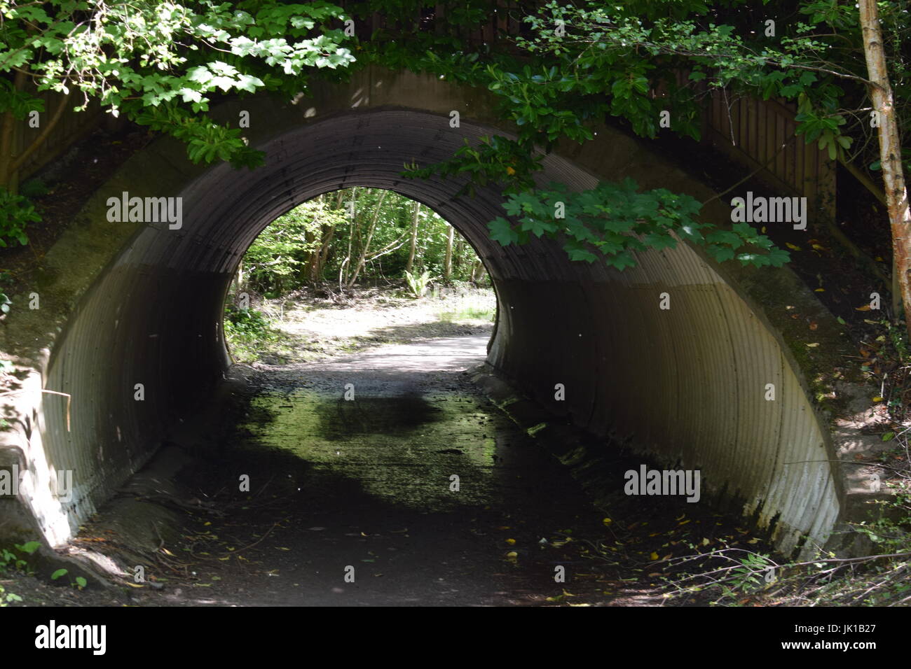 Culvert, a short tunnel Stock Photo - Alamy