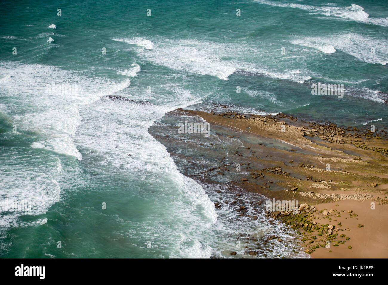 a sea of the atlantic osean at the coast at the village of Luz at the ...