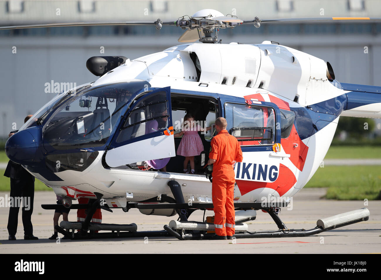 Prince George and Princess Charlotte explore a rescue helicopter as ...