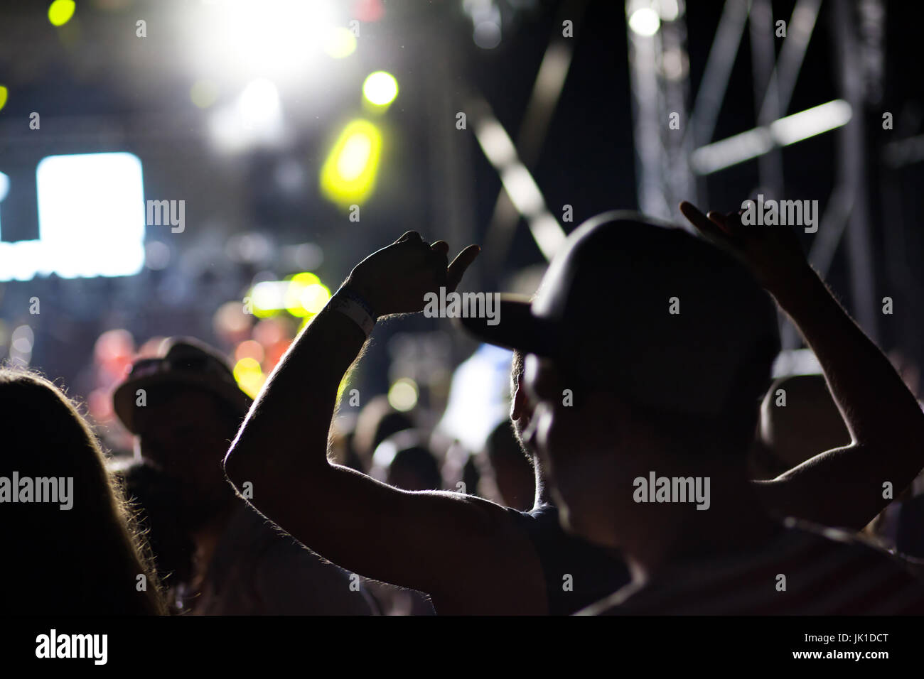 crowd with raised hands at concert - summer music festival Stock Photo ...