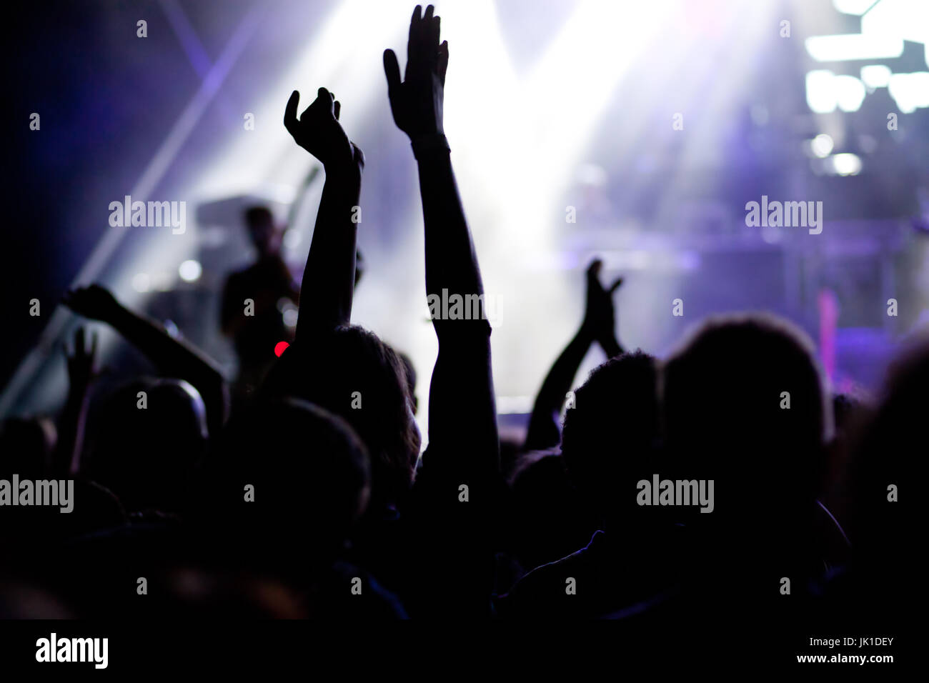 crowd with raised hands at concert - summer music festival Stock Photo ...