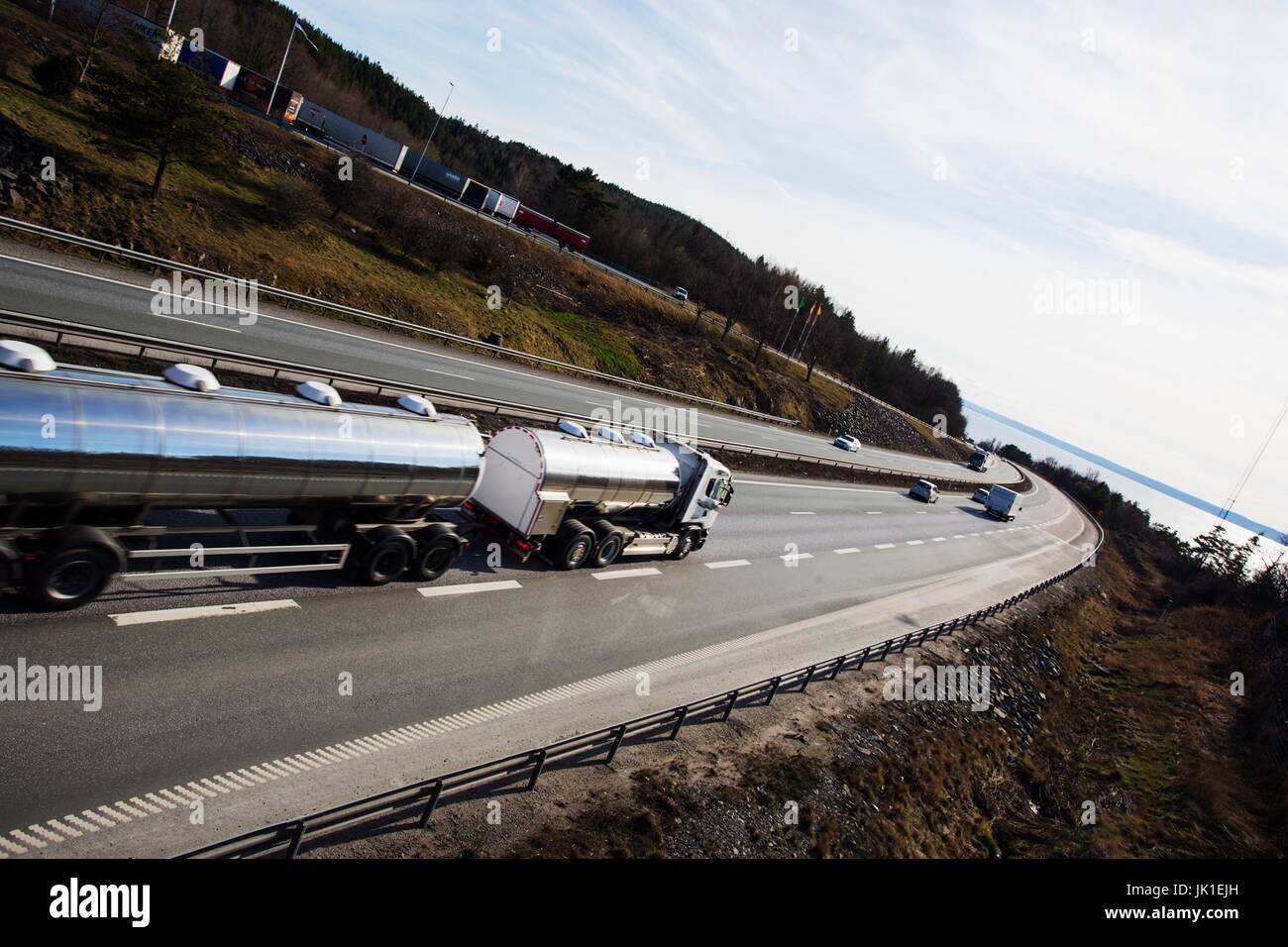 Fuel tanker driving on highway,elevated view Stock Photo - Alamy