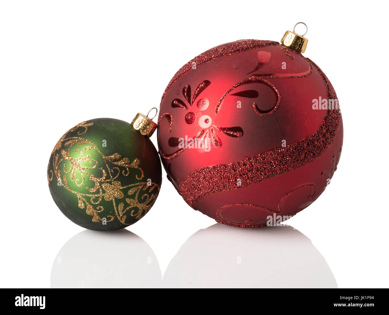 red and green christmas ornaments on white Stock Photo - Alamy