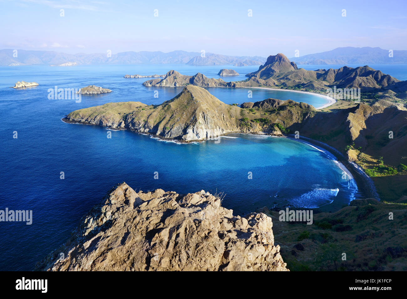 Padar Island with scenic high view of three beautiful white sandy ...