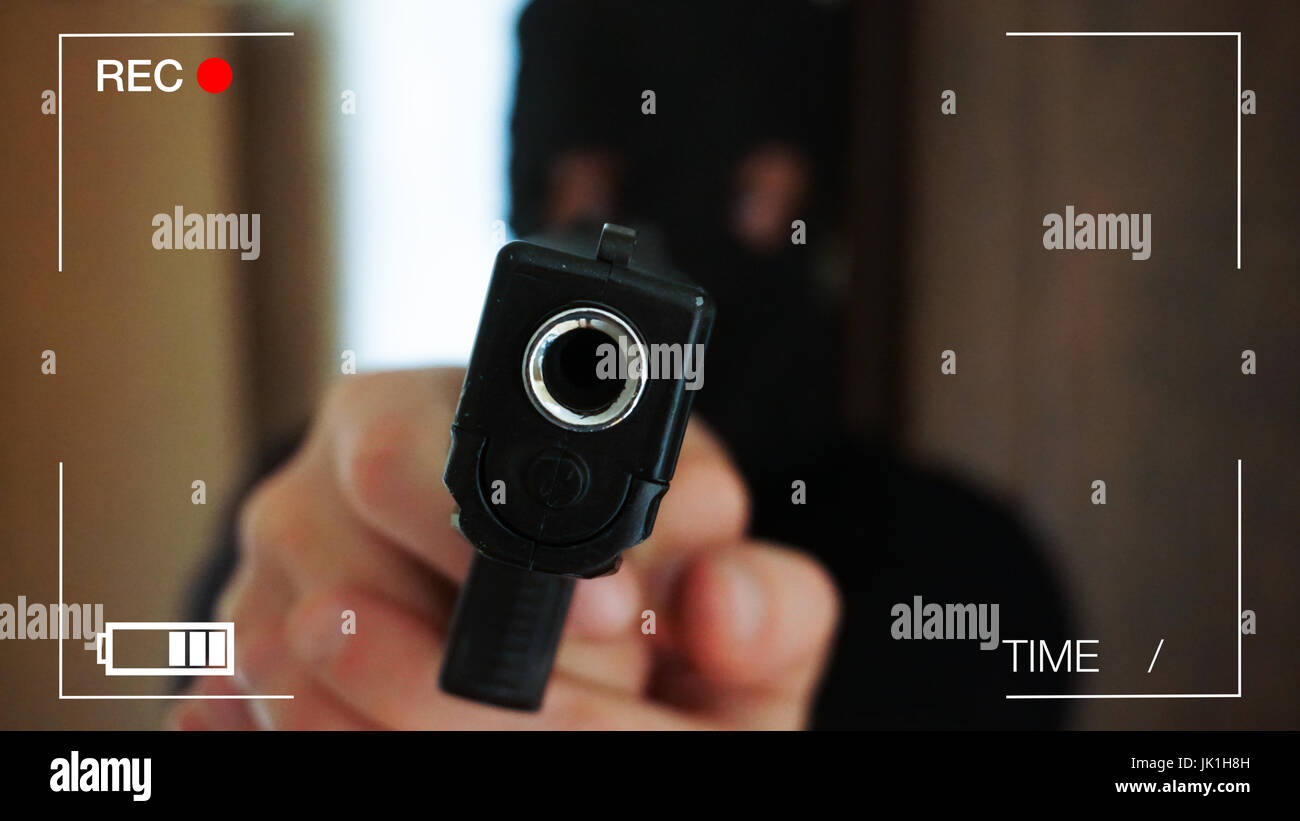 surveillance camera recorded the thief,who broke into the house with a ...