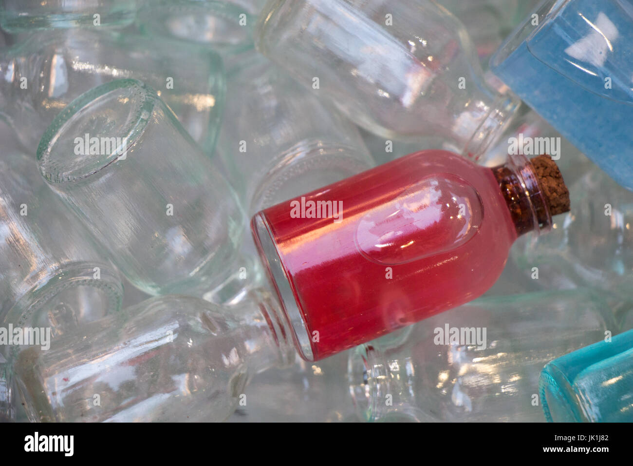 Set of Empty small transparent bottles in a box Stock Photo - Alamy
