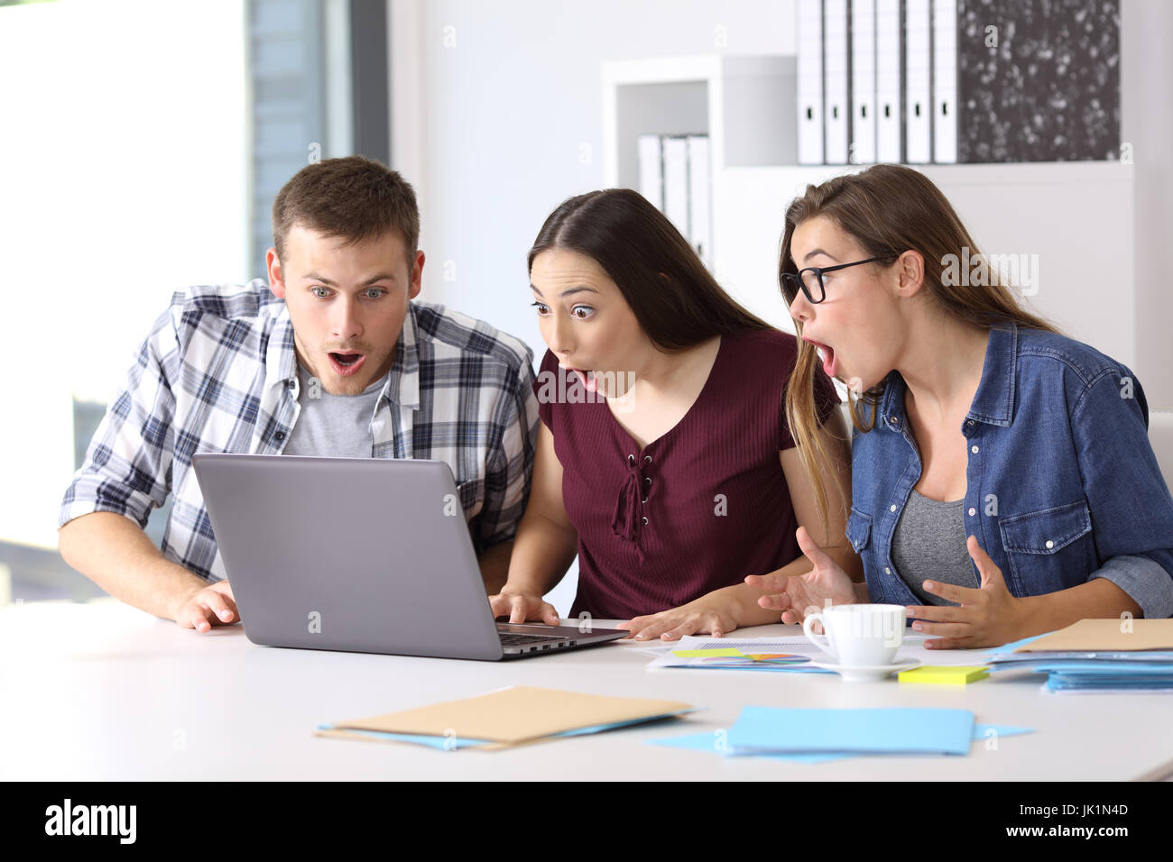Surprised coworkers hi-res stock photography and images - Alamy