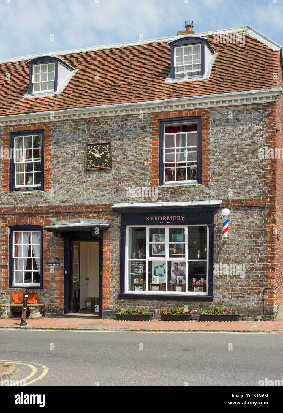 Old brick and tile building now barber shop in Alfriston, near ...