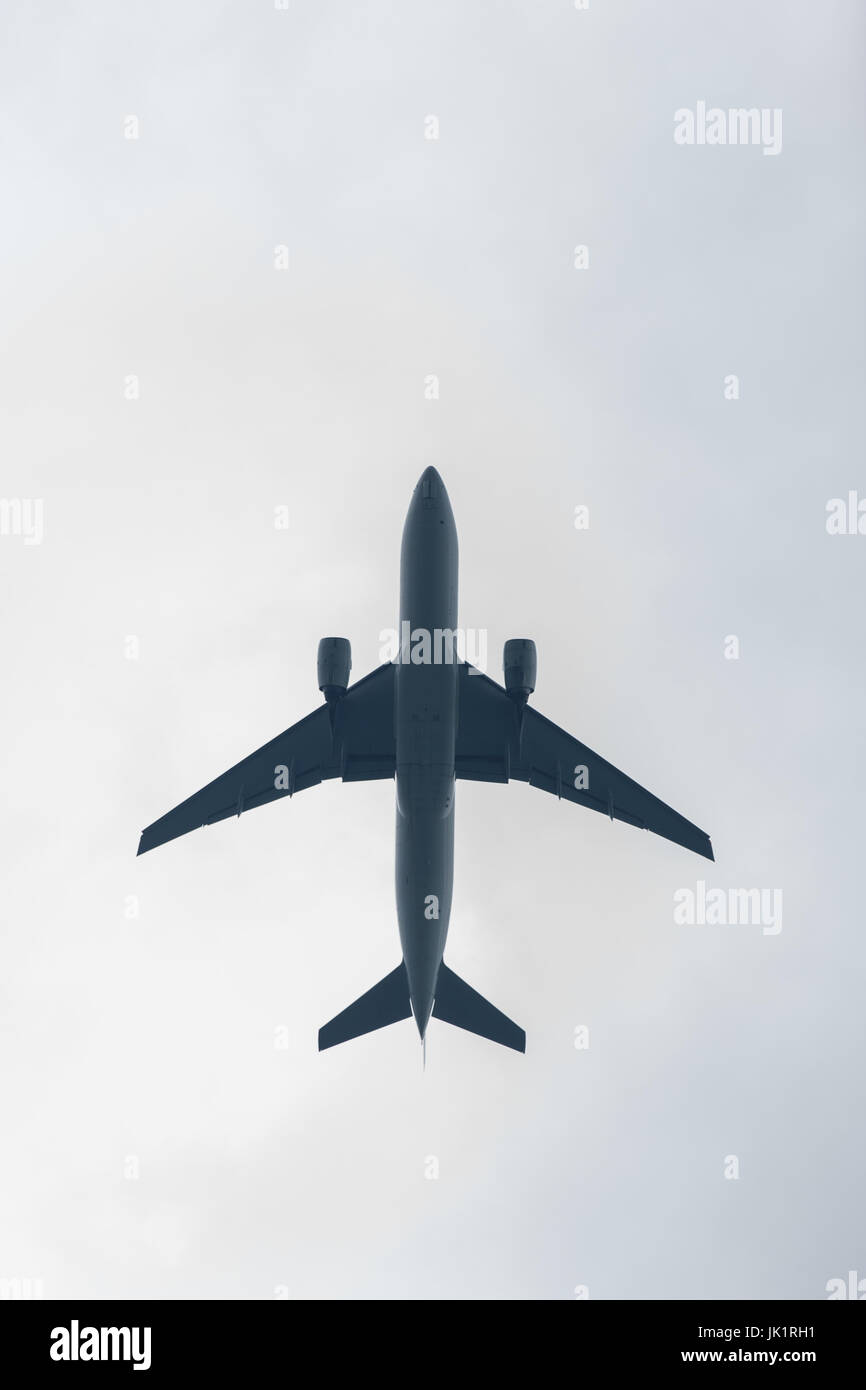Photo of airplane in sky Stock Photo - Alamy