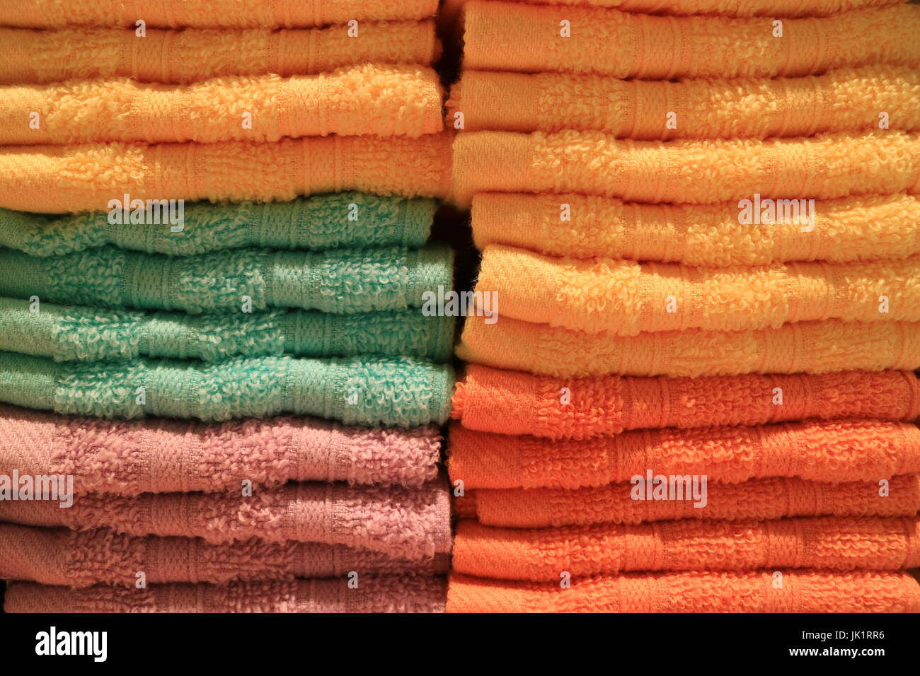 Stack of folded vibrant color bath towels, Texture, Background Stock ...