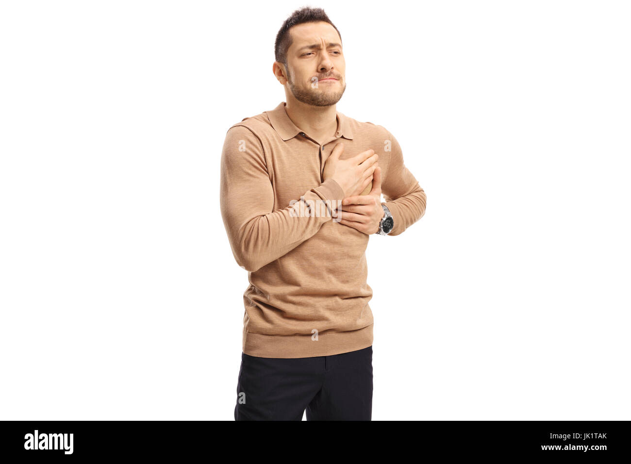 Young man having chest pain isolated on white background Stock Photo ...