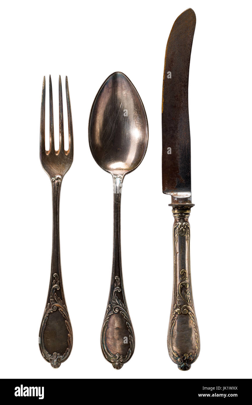 old antique cutlery isolated on white background, clipping path for ...