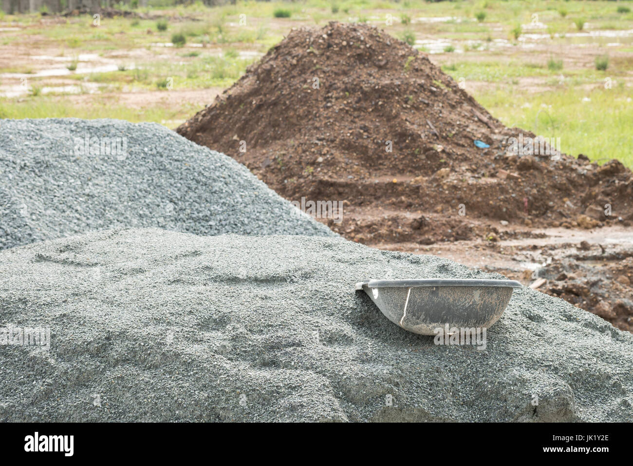 Black clam shell shaped basket on gravel Stock Photo - Alamy