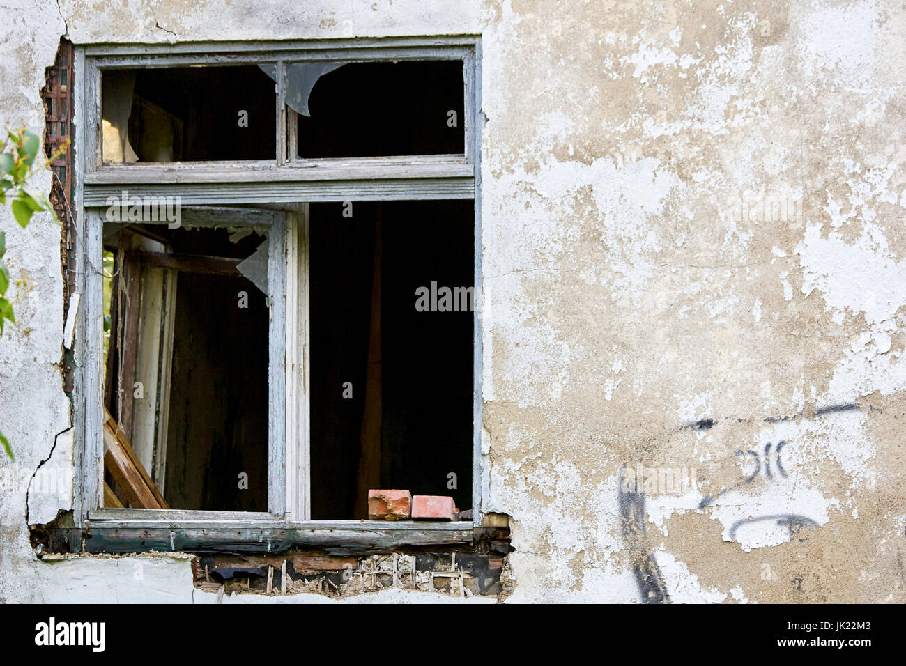 Broken window glass in the old abandoned house Stock Photo - Alamy