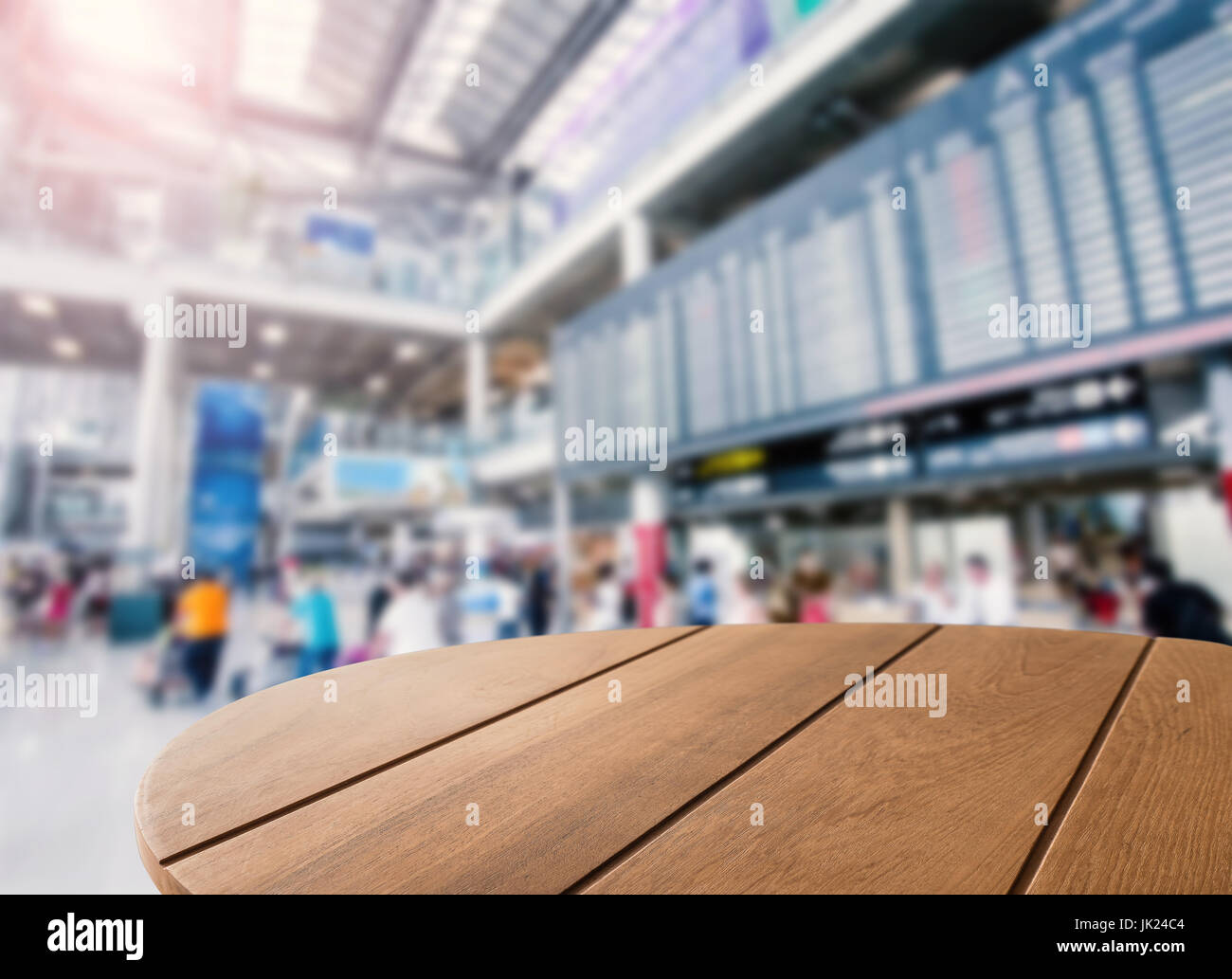 wooden coffee table with airport background Stock Photo - Alamy