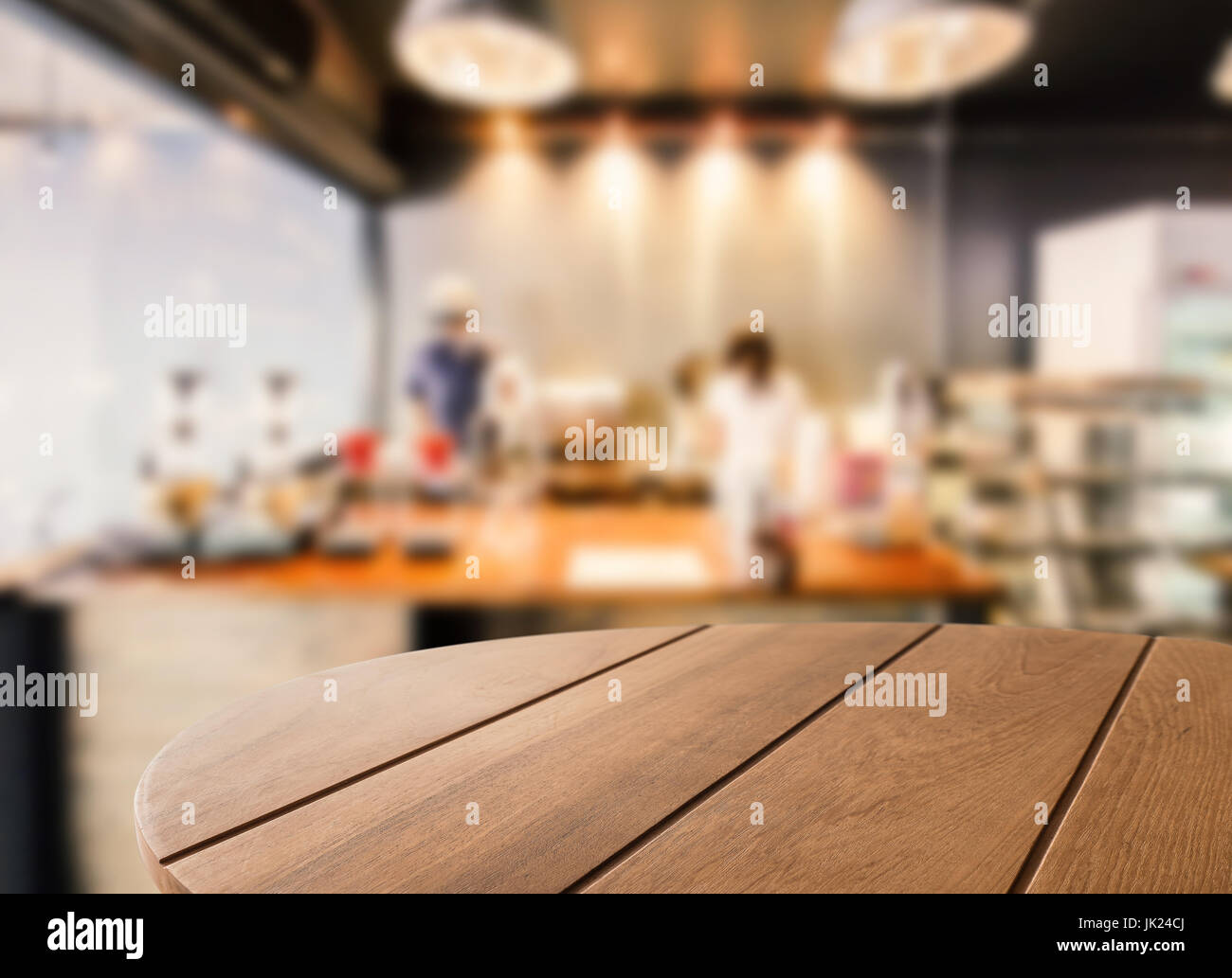 wooden coffee table with coffee shop background Stock Photo - Alamy