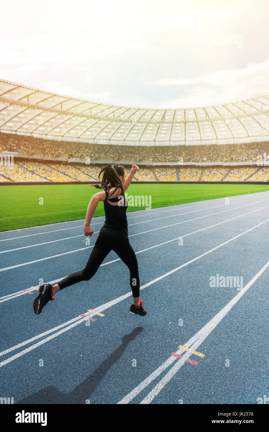 Woman sprinting hi-res stock photography and images - Alamy