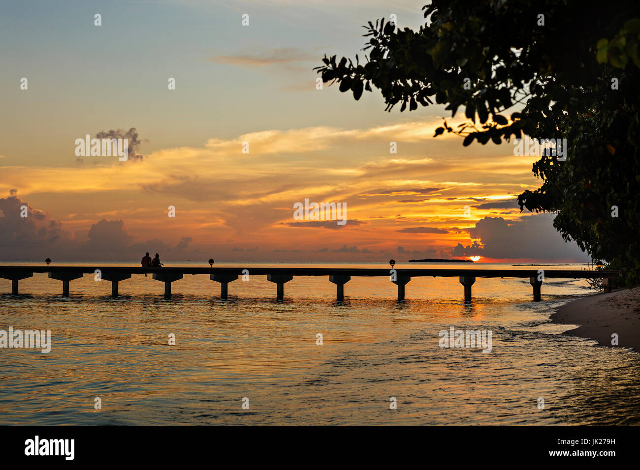 Awesome vivid sunset over the jetty in the Indian ocean Stock Photo - Alamy
