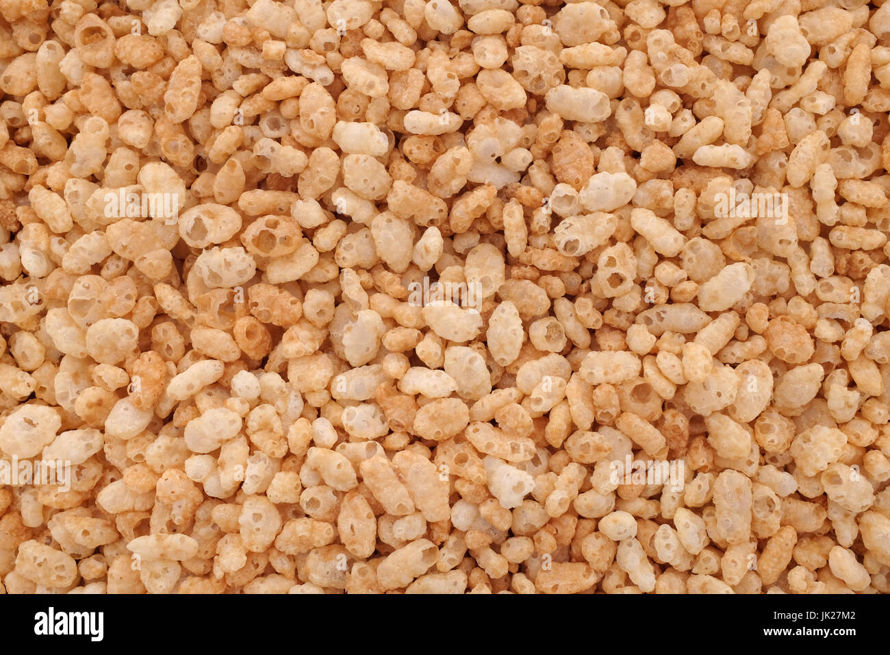Crisped puffed rice breakfast cereal as an abstract background texture ...