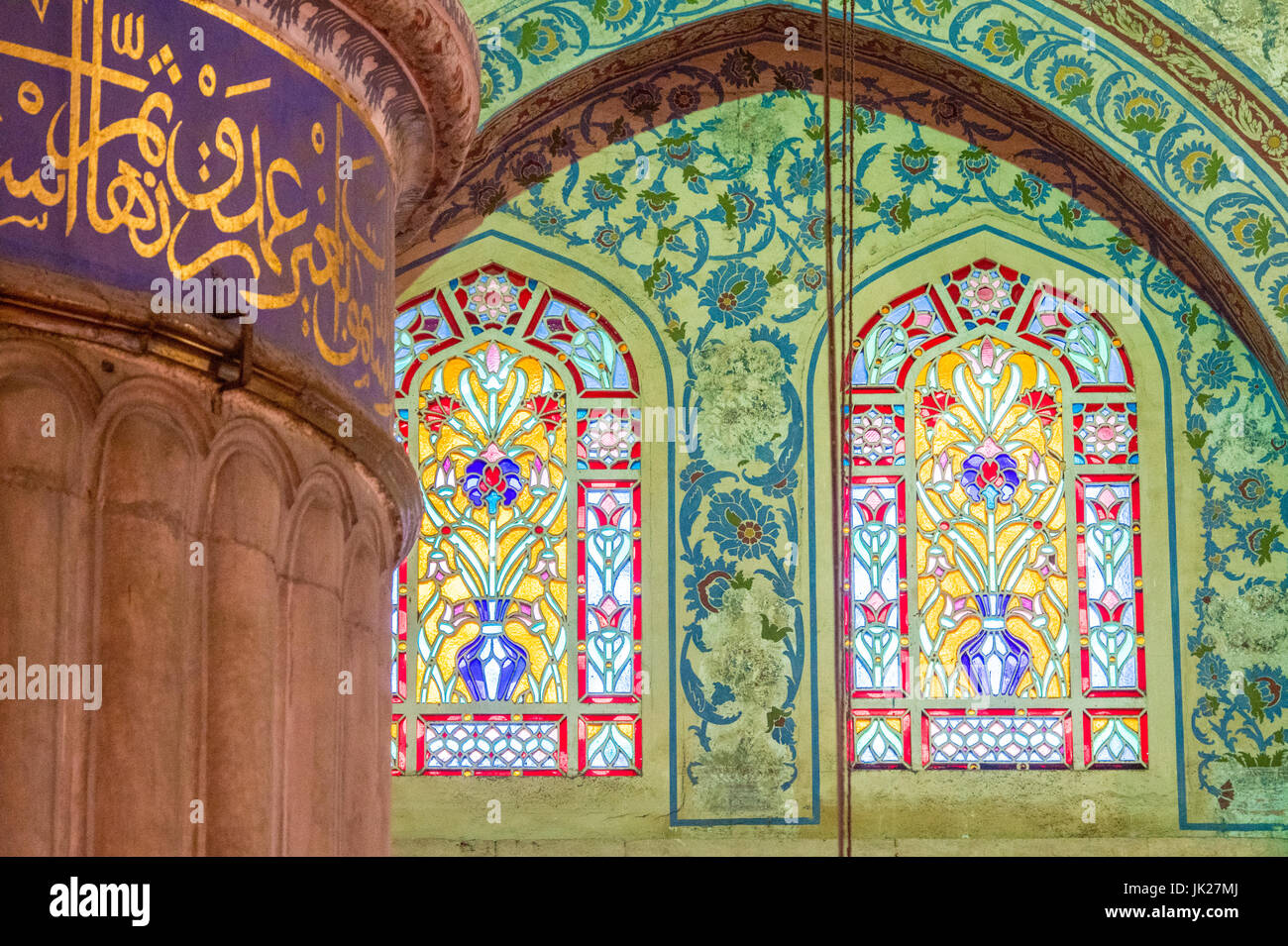 Beautiful and detailed view of the stained glass and colorful tile work ...