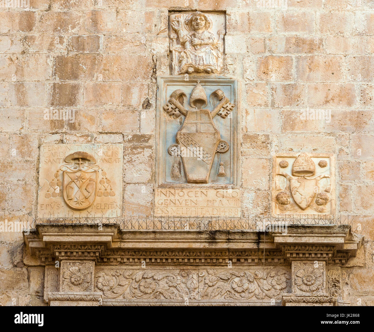 bas-reliefs of stone with Latin inscription surmounting the entrance of ...