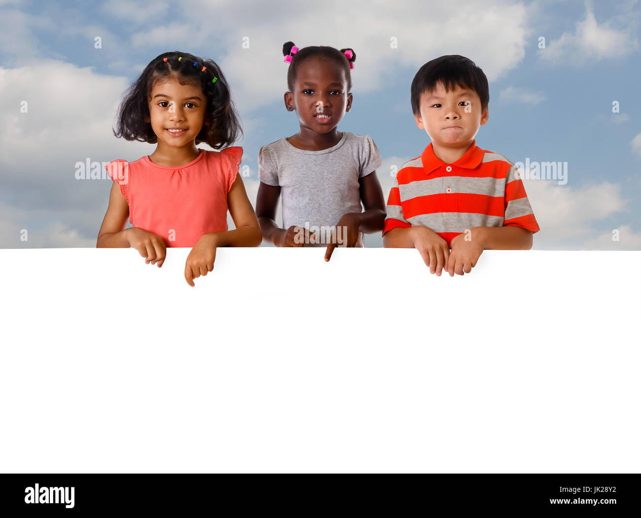 Group of multiracial happy kids portrait on sky background with white ...