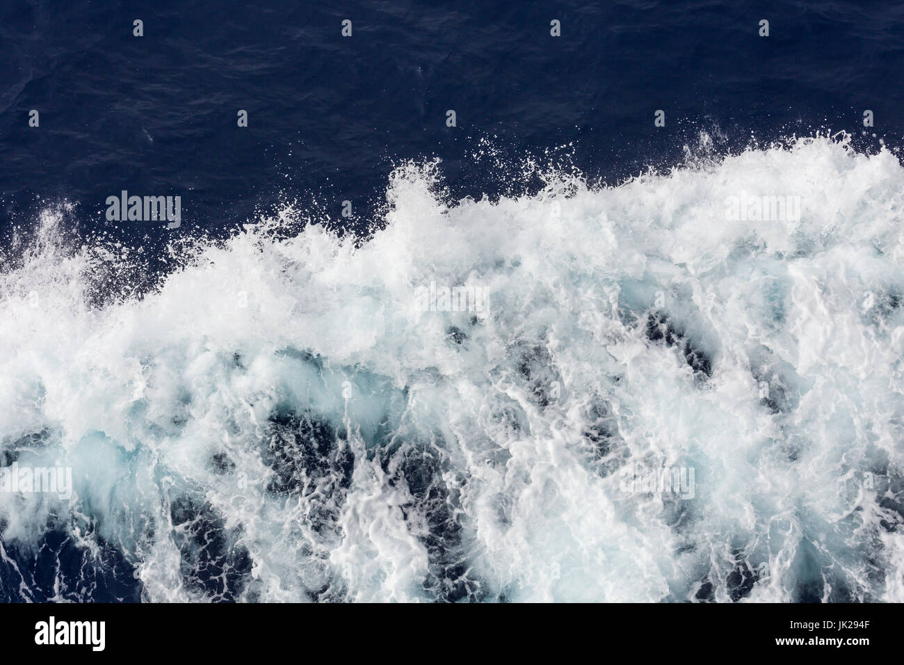 Blue ocean waves wake on cruise vacation Stock Photo - Alamy