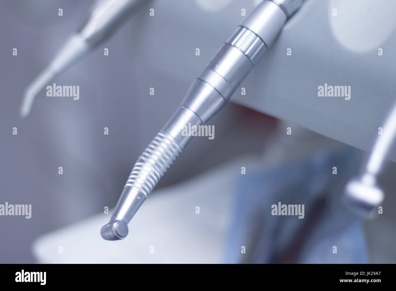 Dentists modern dental drill equipment in dentist's chair in dental ...