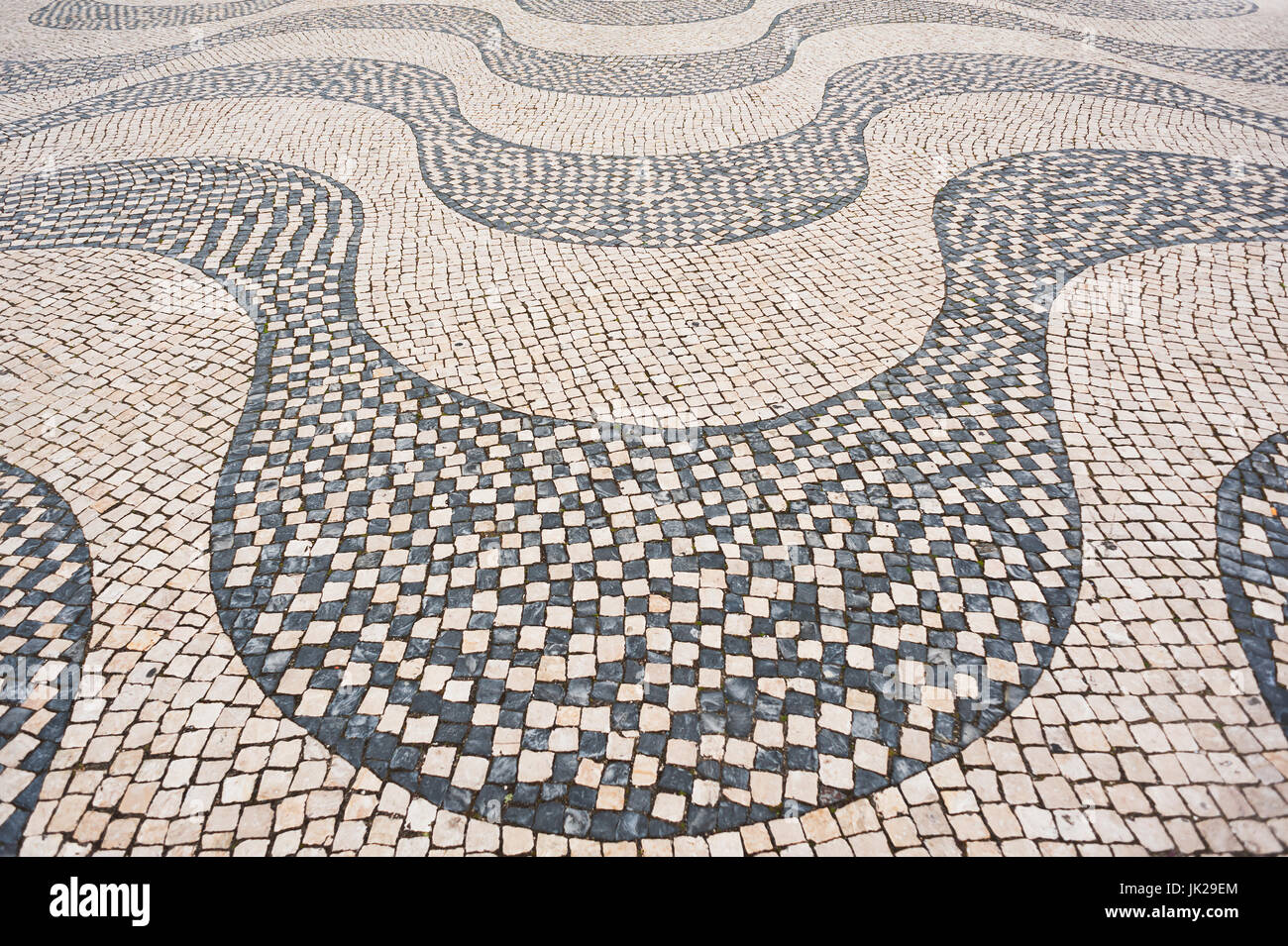 Traditional Portuguese pavement (cobblestone) in Lisbon, Portugal Stock ...
