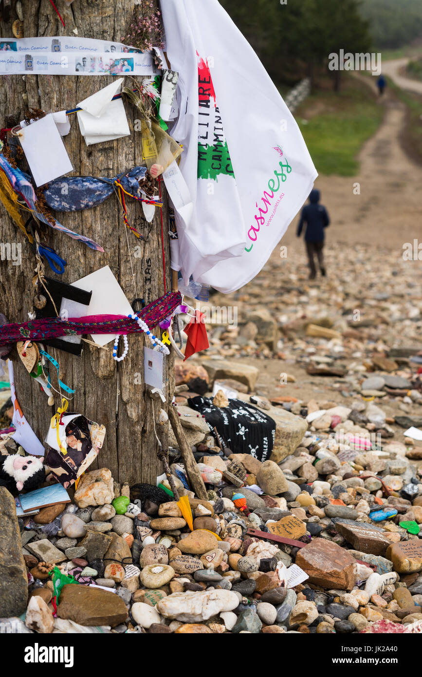 Pilgrims on the Cruz de Ferro, Spain. Camino de Santiago Stock Photo ...