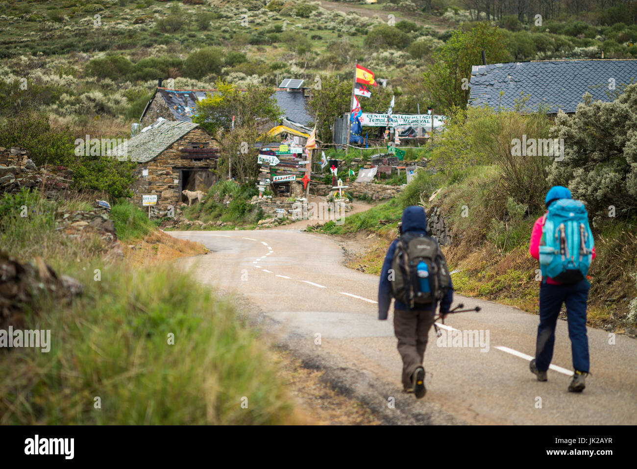 Pilgrims walking camino de Santiago in the Manjarin village, Spain ...