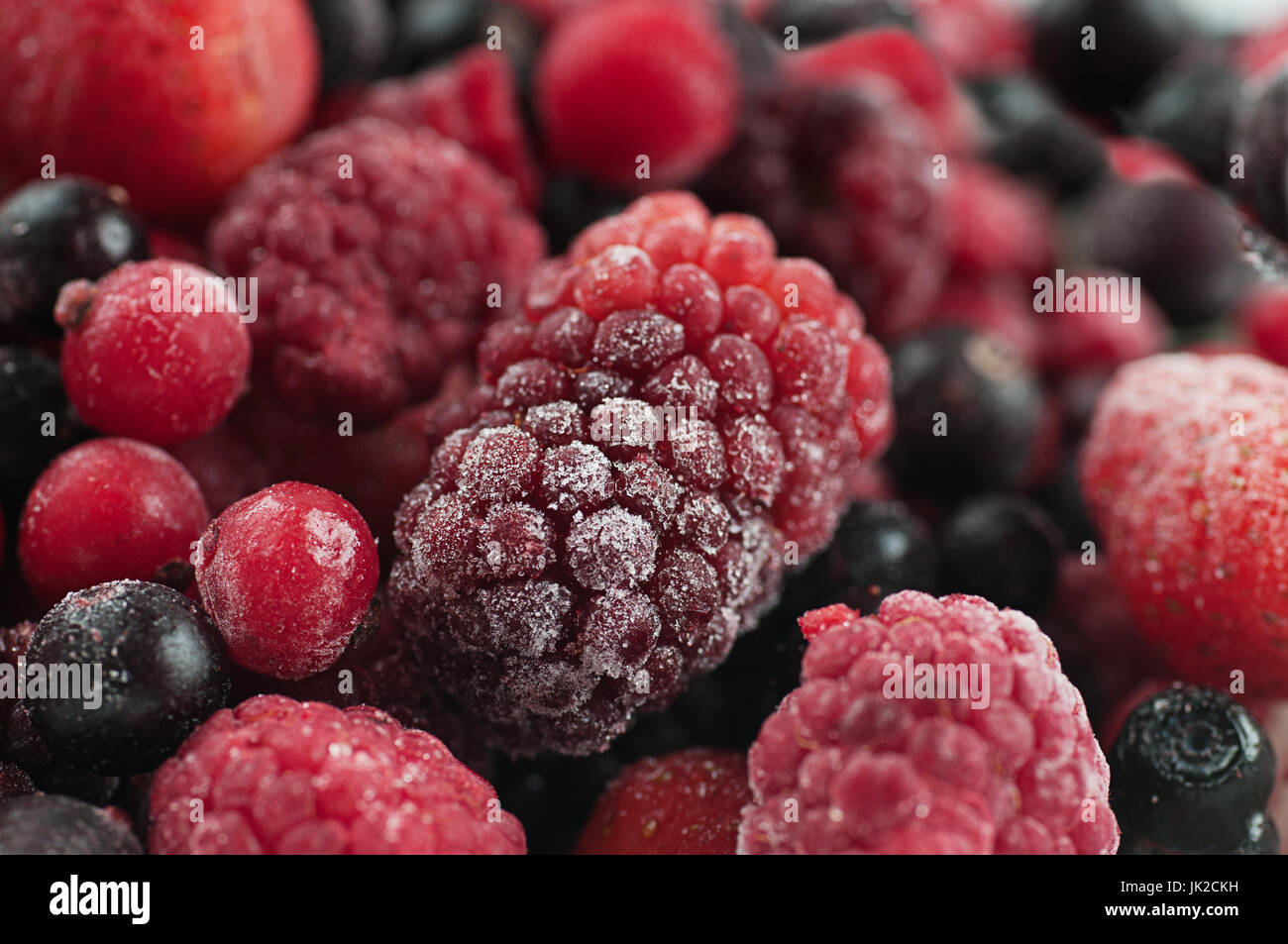 Mixed colorful frozen fruit Stock Photo - Alamy