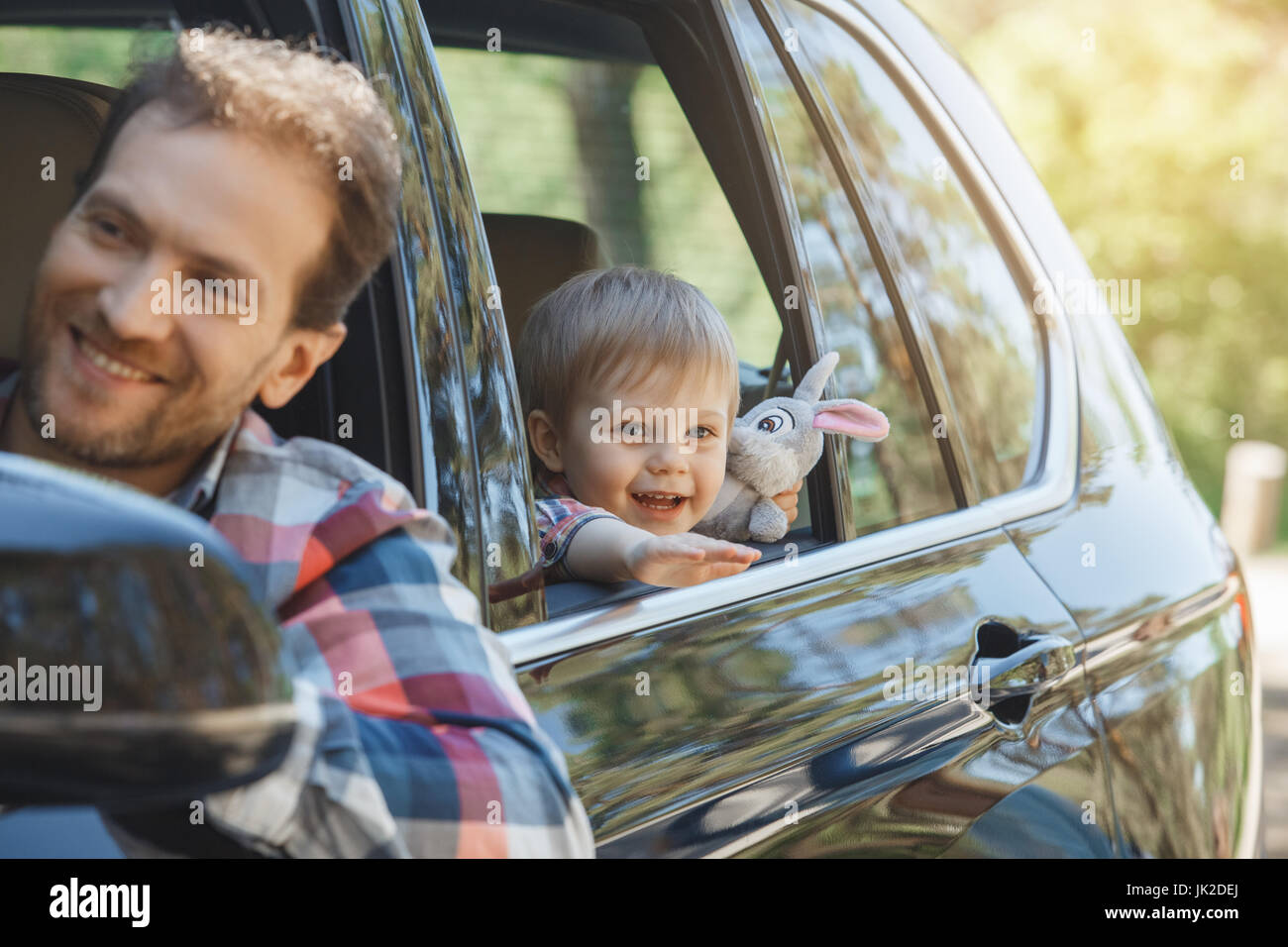 Man car lean out window hi-res stock photography and images - Alamy