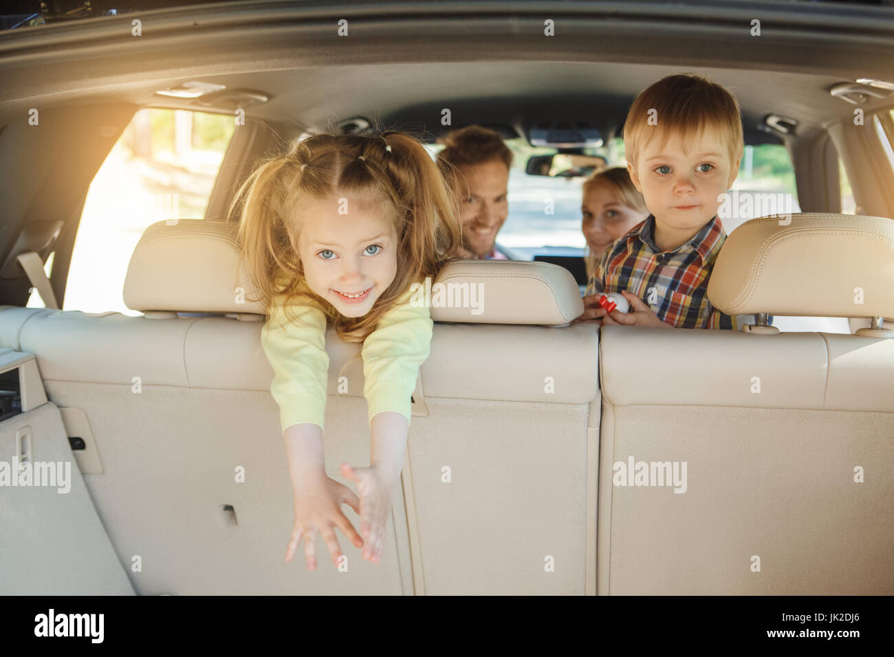 Travel by car family ride together inside the vehicle Stock Photo - Alamy