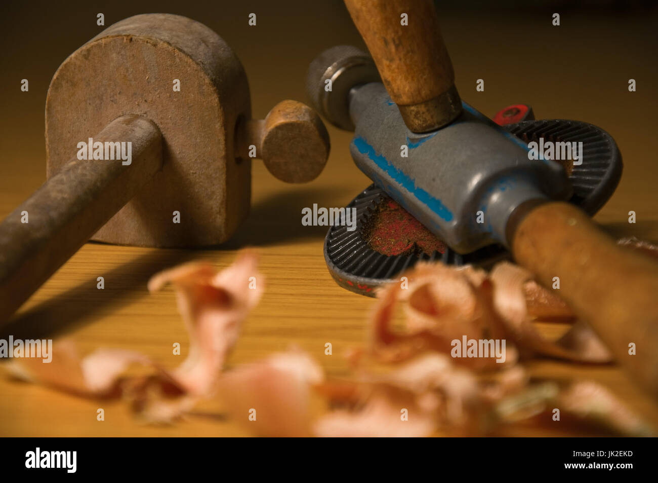 Still life showing wood working tools on a bench with chippings or ...