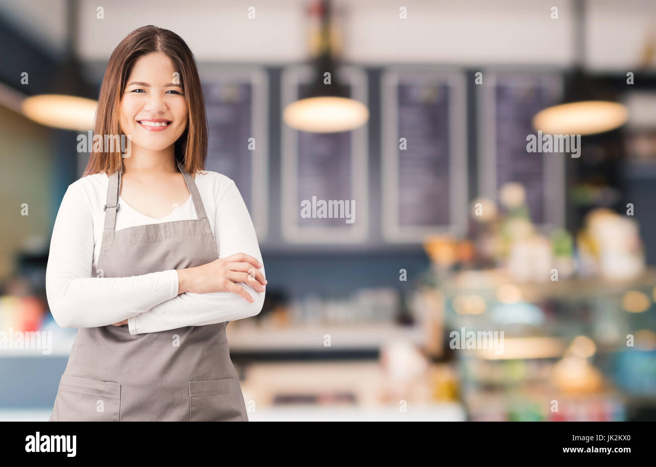 asian business owner with bakery shop background Stock Photo - Alamy