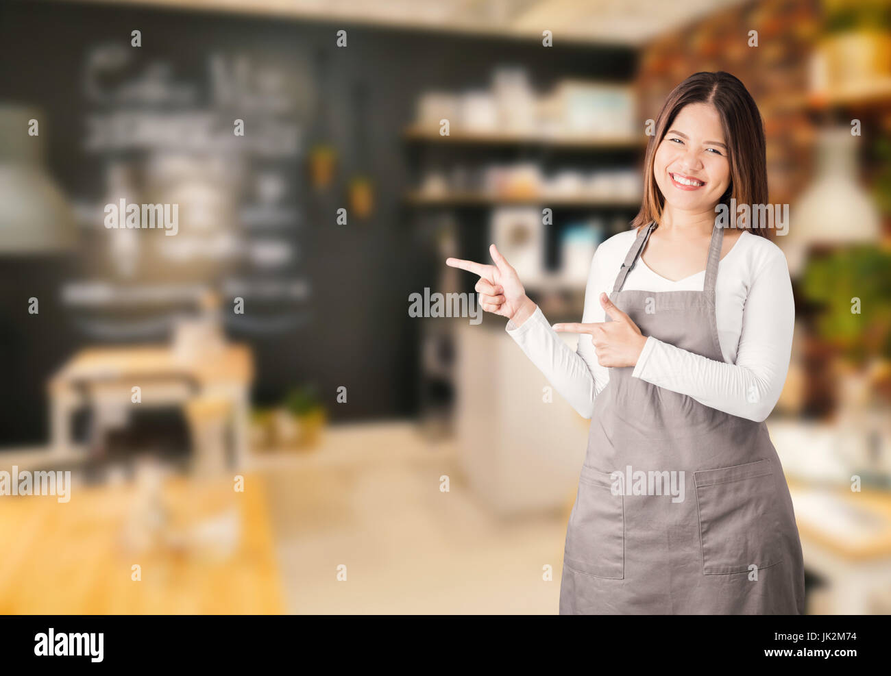 business owner with coffee shop background Stock Photo - Alamy