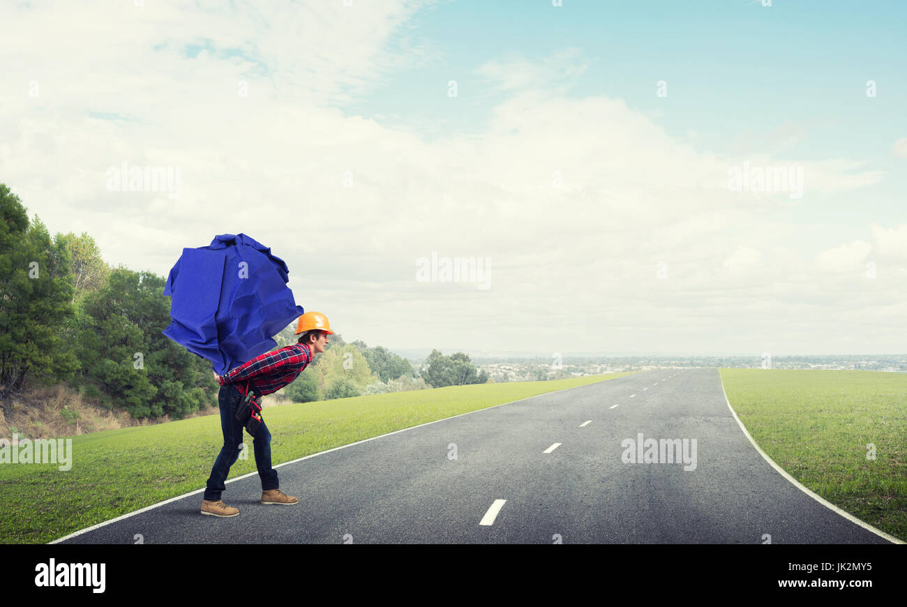 Engineer man carry load Stock Photo - Alamy