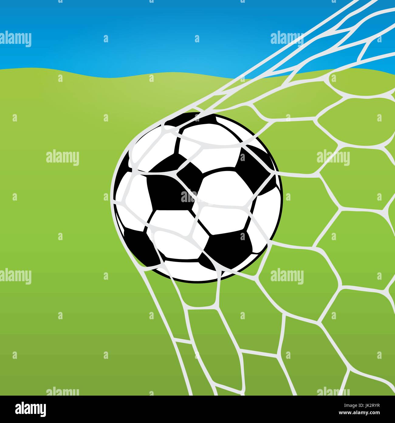 Soccer ball flying into the net, ball in goal against the background of ...