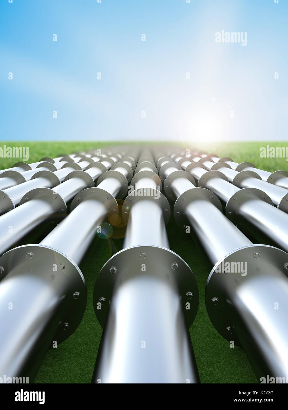metal pipeline with green field and blue sky background Stock Photo - Alamy
