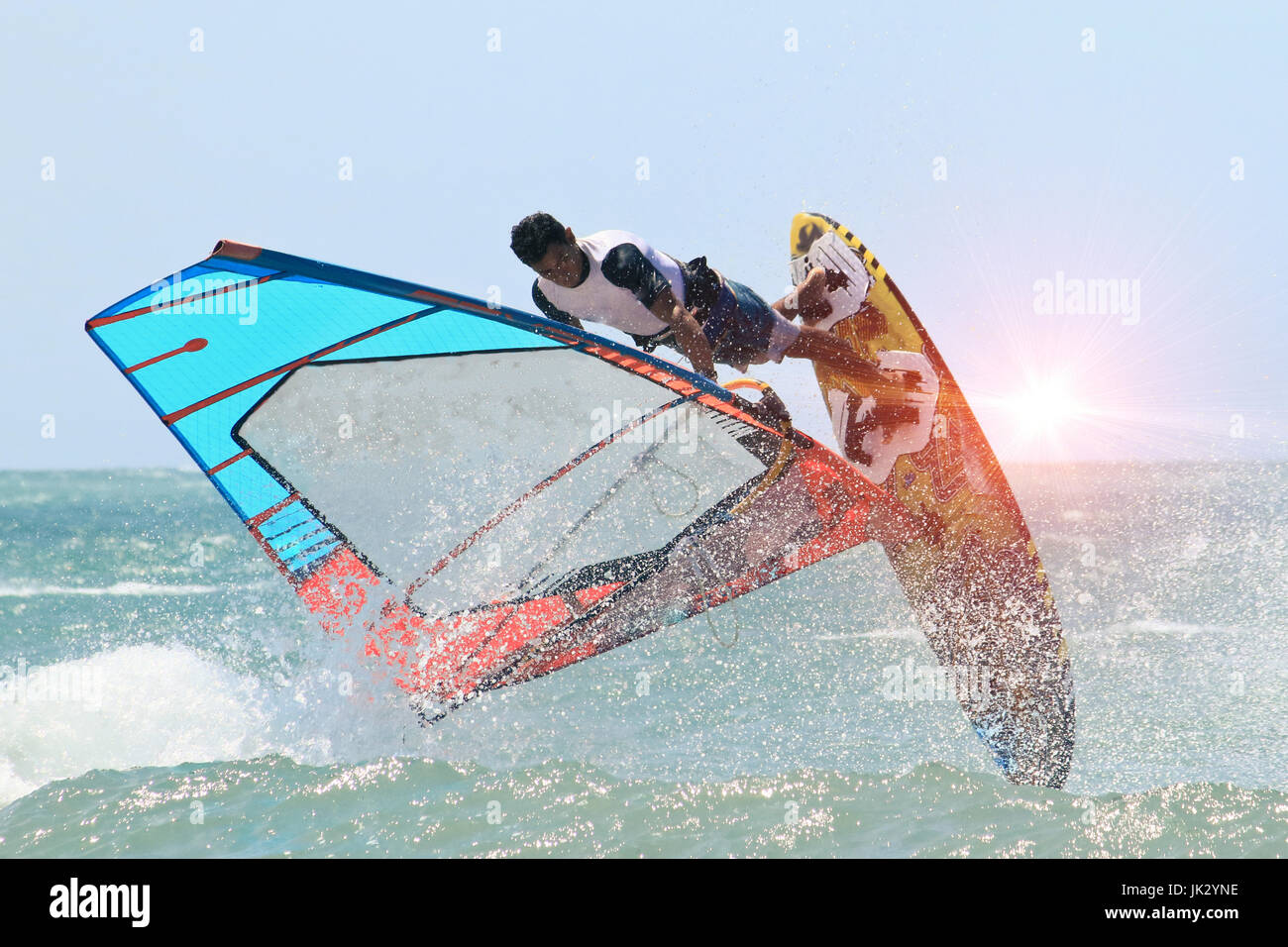 latin windsurfer is training at his home spot Stock Photo - Alamy