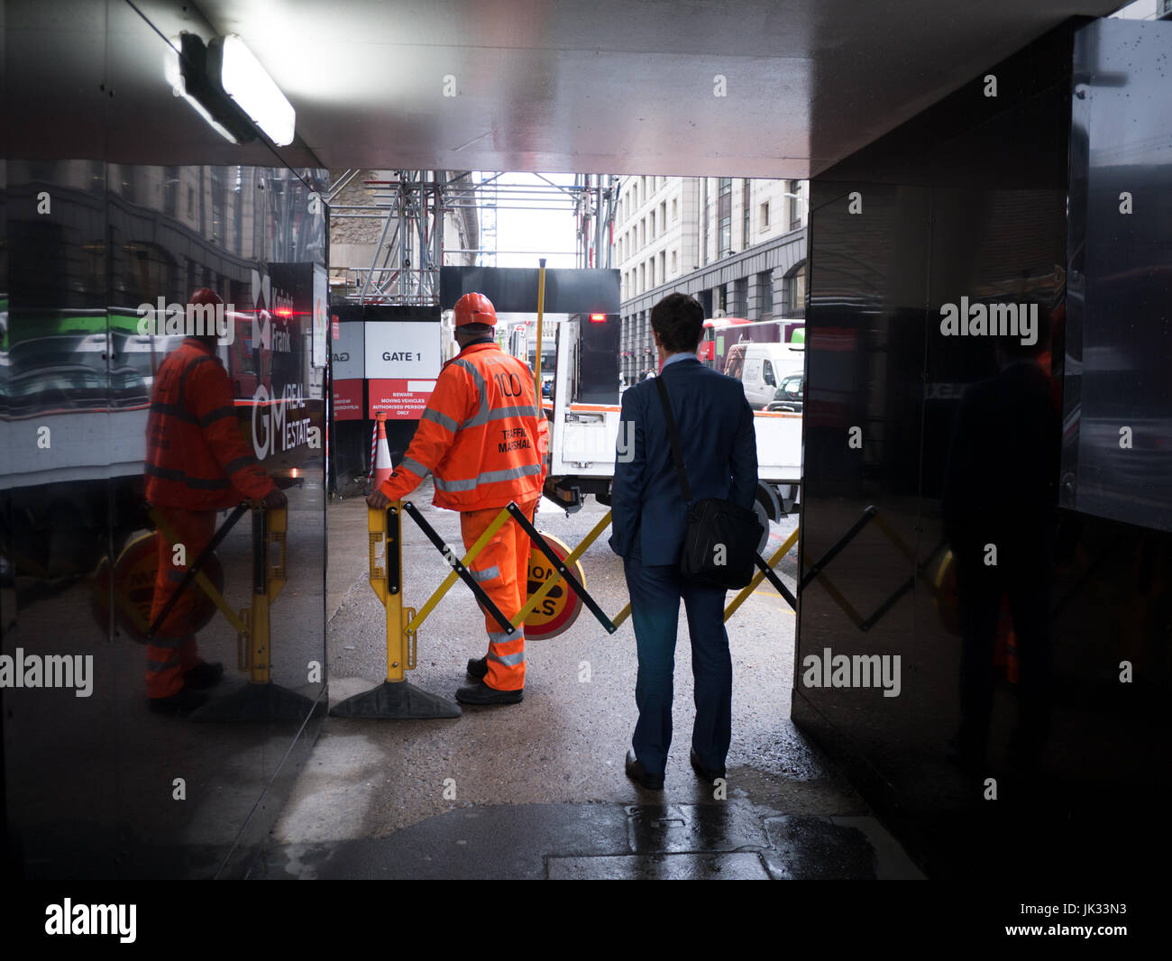Traffic marshall on Bloomberg building site London operating safety ...