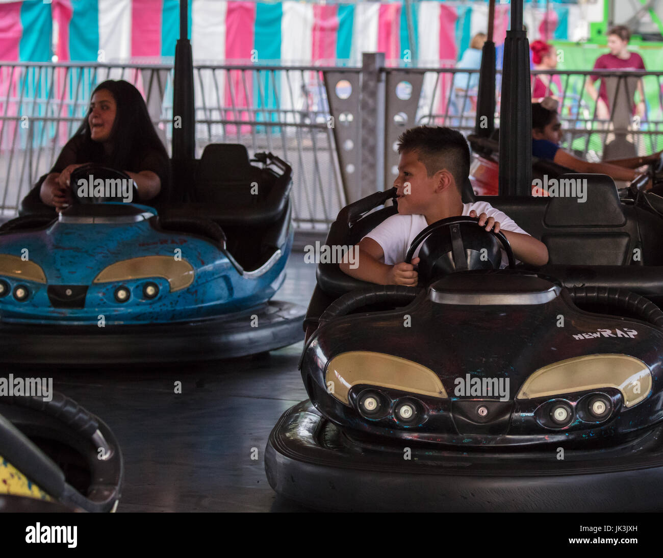 Fair goers enjoying a ride on the midway of the California State Fair ...
