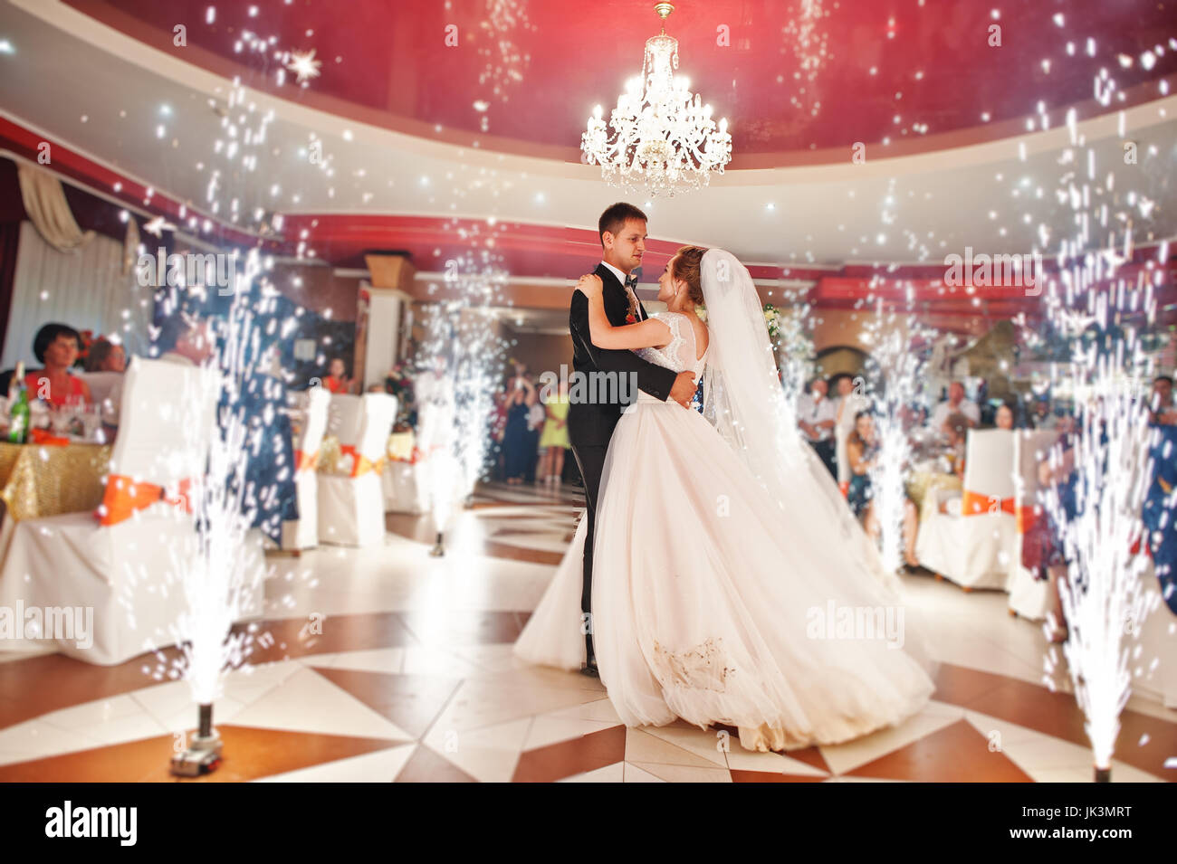 The first dance of newly married couple at their wedding party in ...