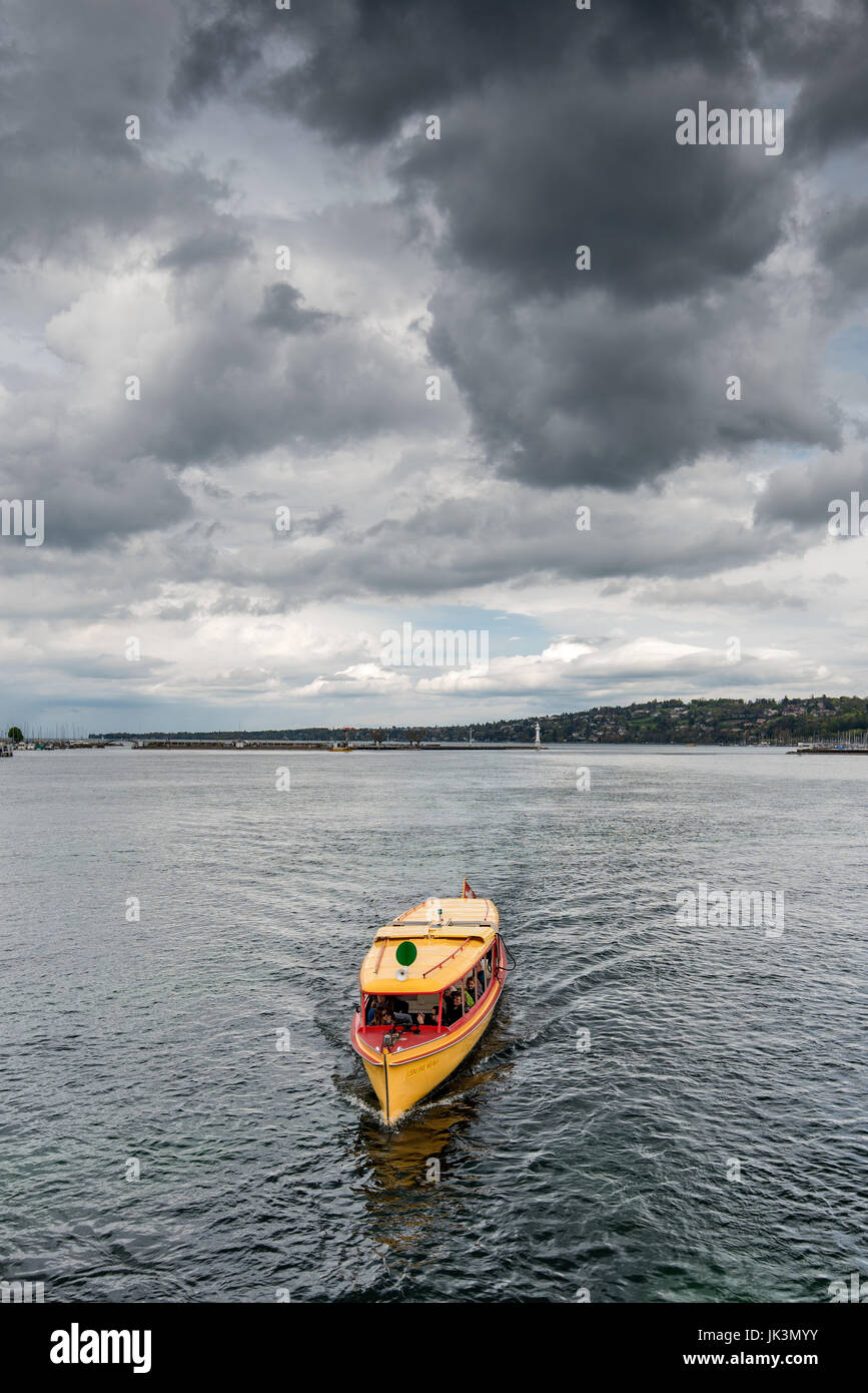 Geneva Switzerland, company of traditional boats yellow and red, called ...
